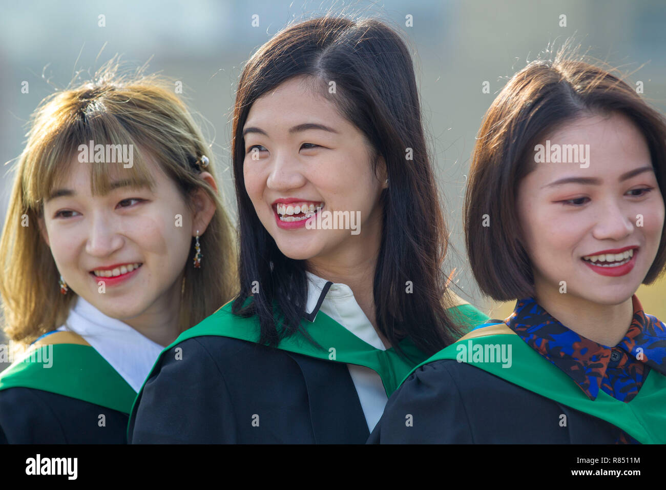 International students celebrating graduation Stock Photo - Alamy