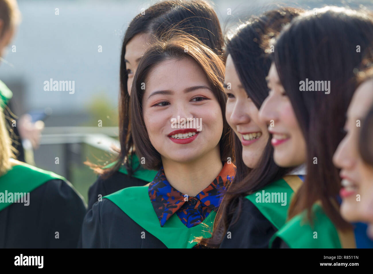International students celebrating graduation Stock Photo - Alamy