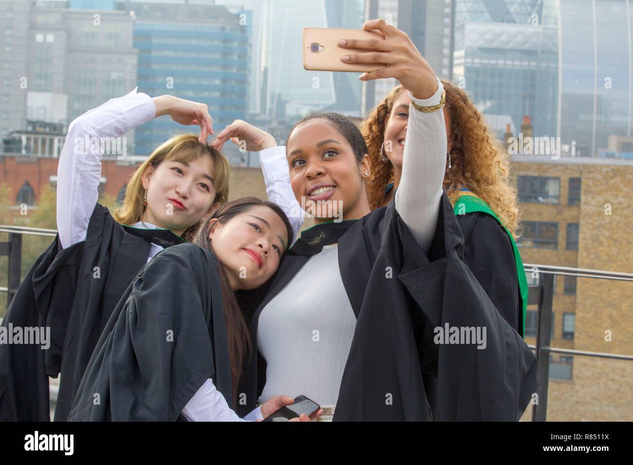 International students celebrating graduation Stock Photo - Alamy