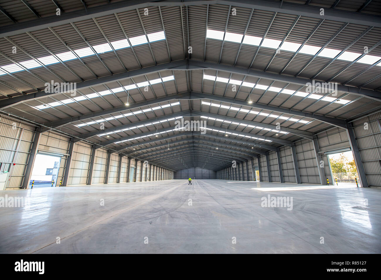 enormous empty warehouse space Stock Photo - Alamy