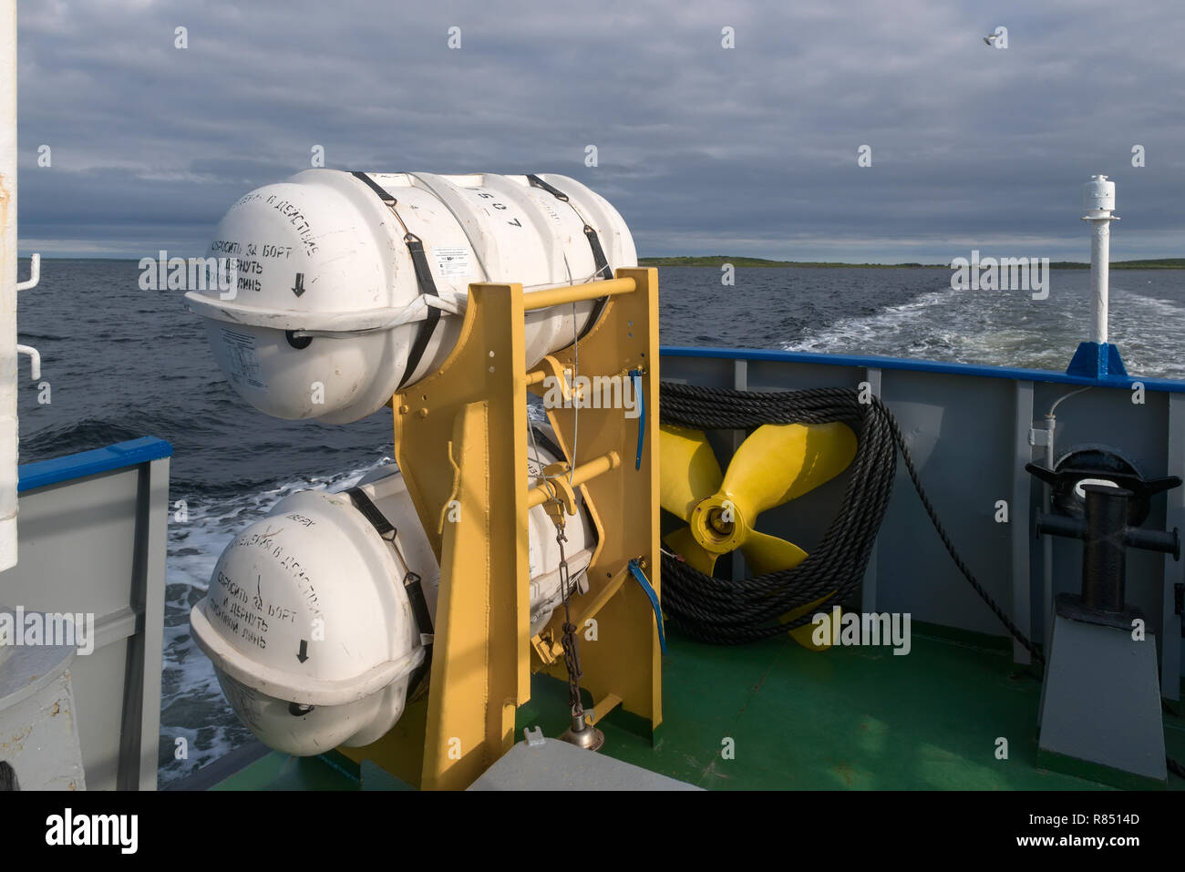 Life saving raft container on ship Stock Photo - Alamy