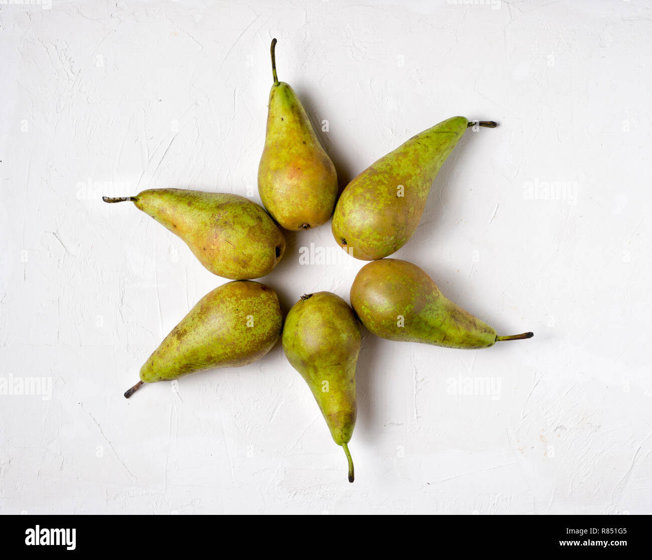 Pear on white background. Sun or star shape from pears on white ...