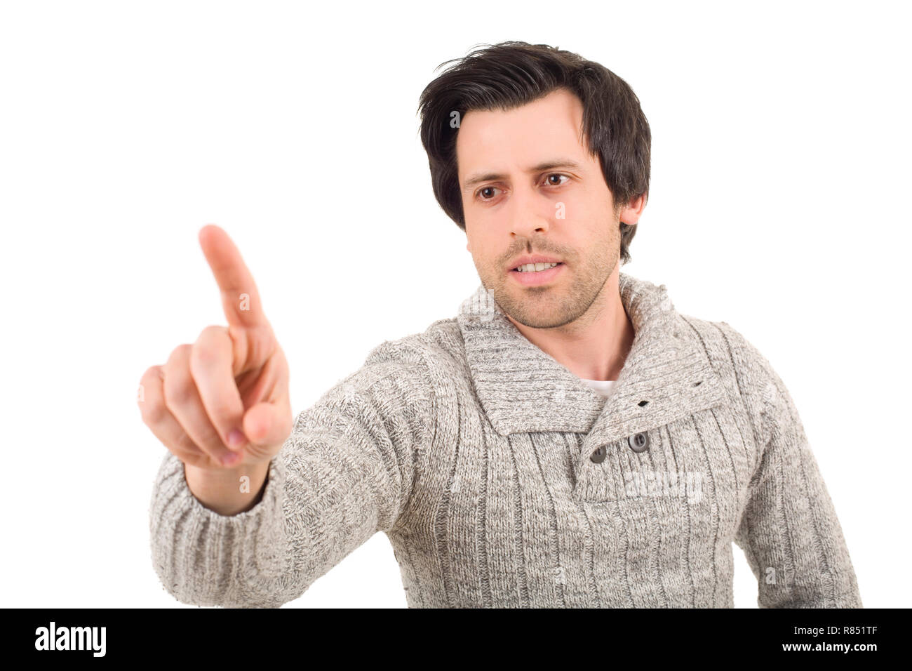 Casual man pointing up with his finger, isolated on white Stock Photo ...