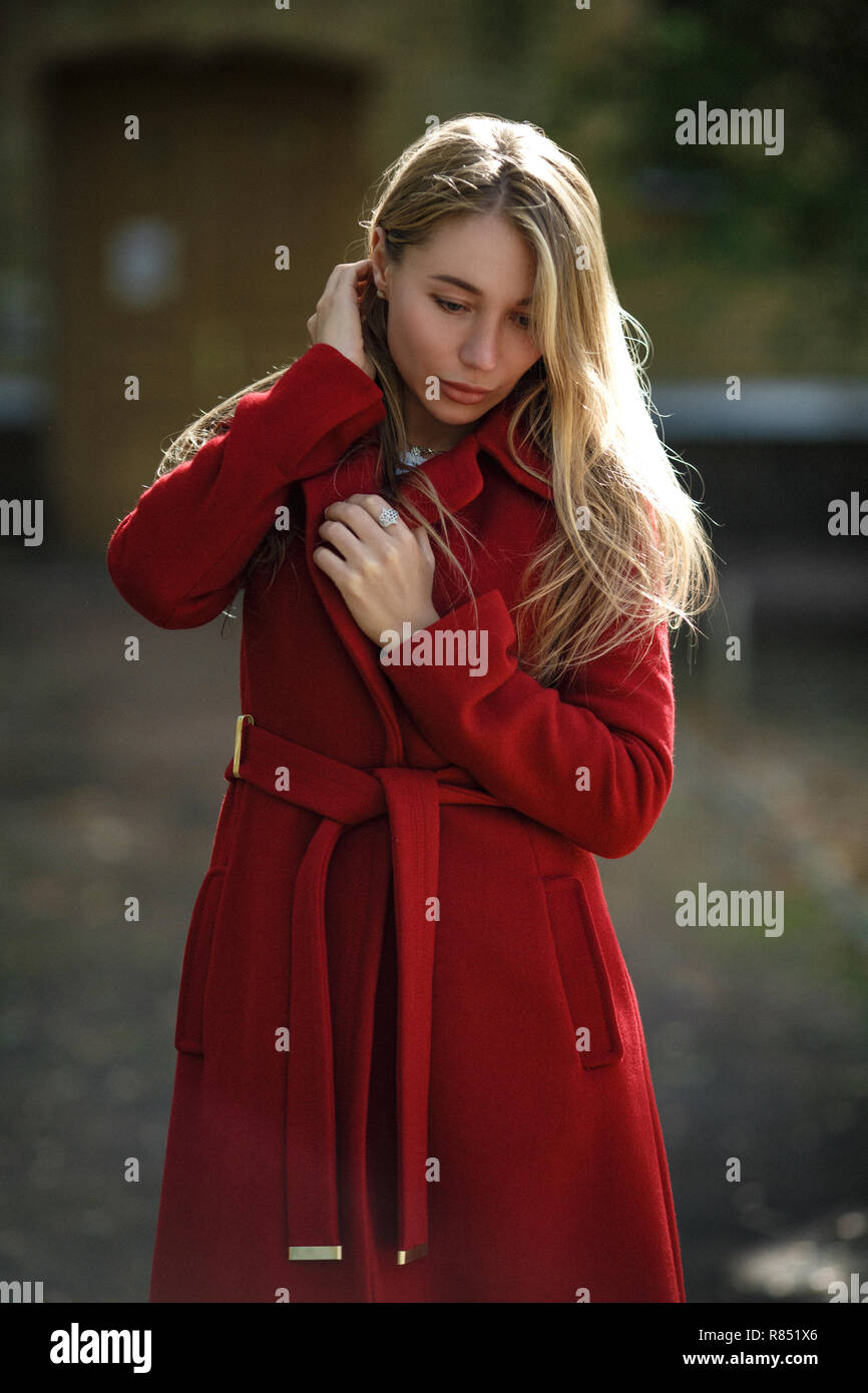 Wearing red coat jacket hi-res stock photography and images - Alamy
