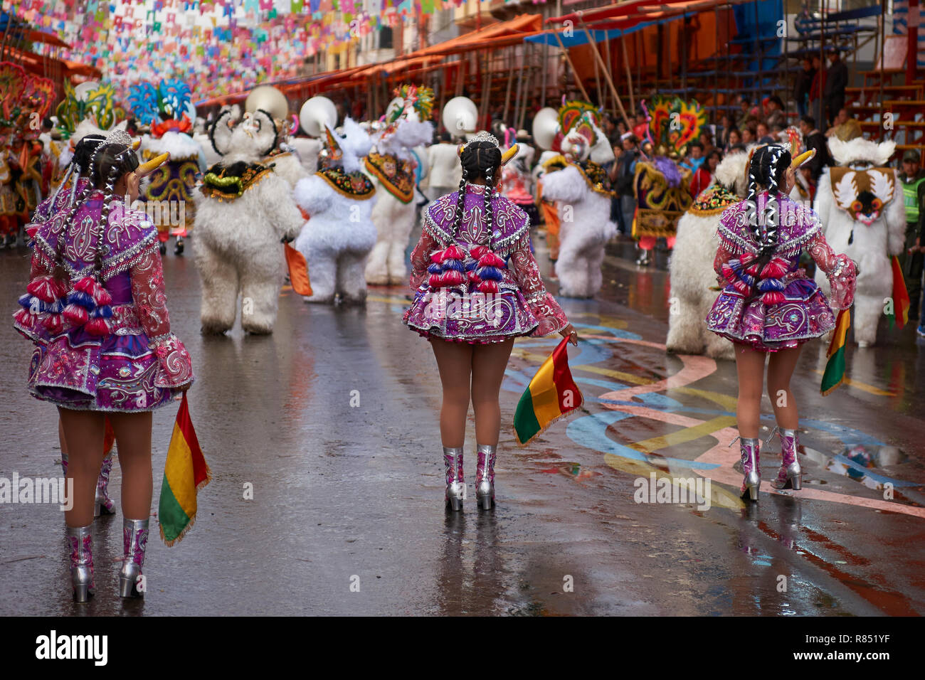 Diablada dancers in ornate costumes parade through the mining city of ...