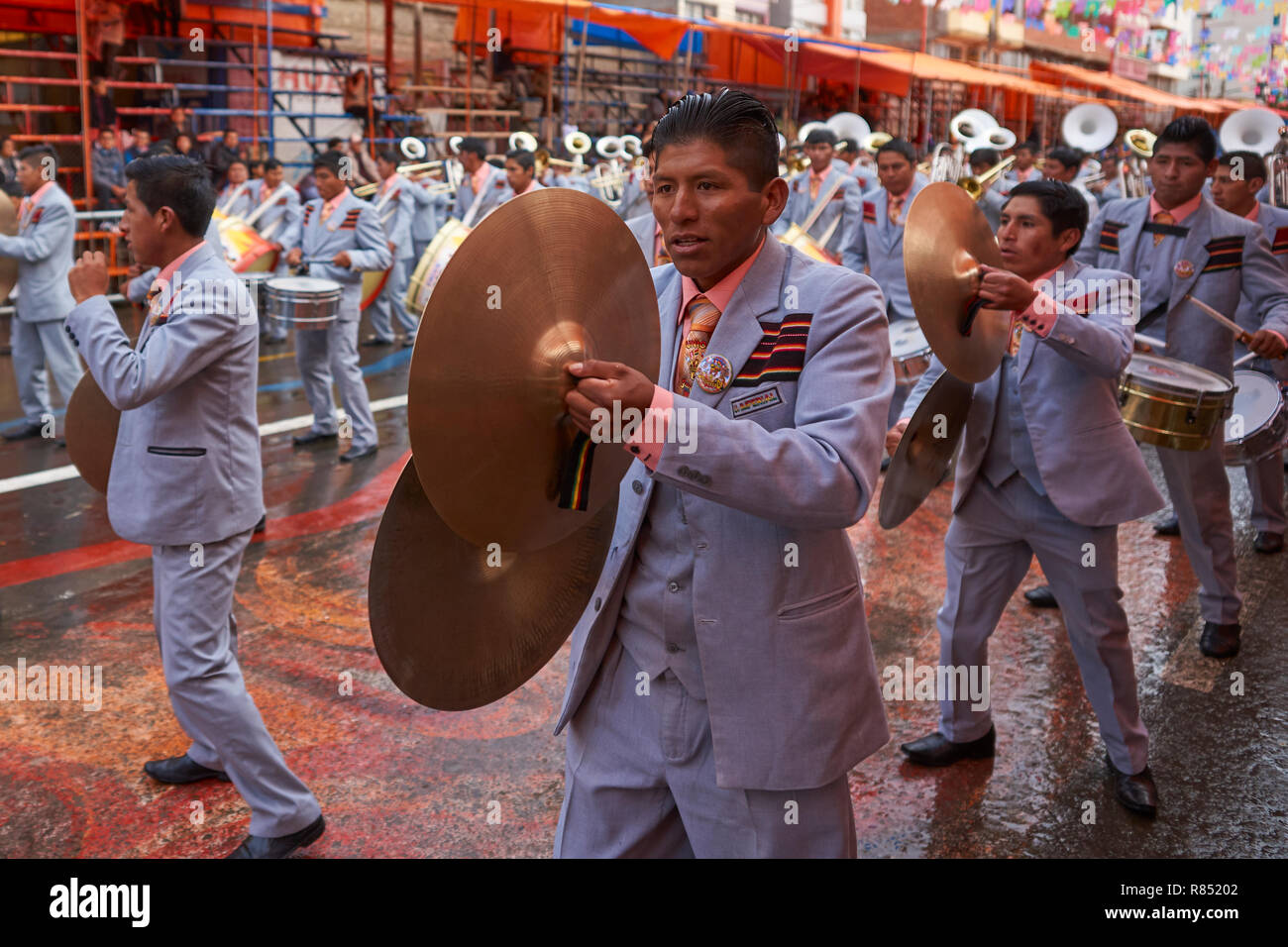 Band parading through the mining city of Oruro on the Altiplano of ...