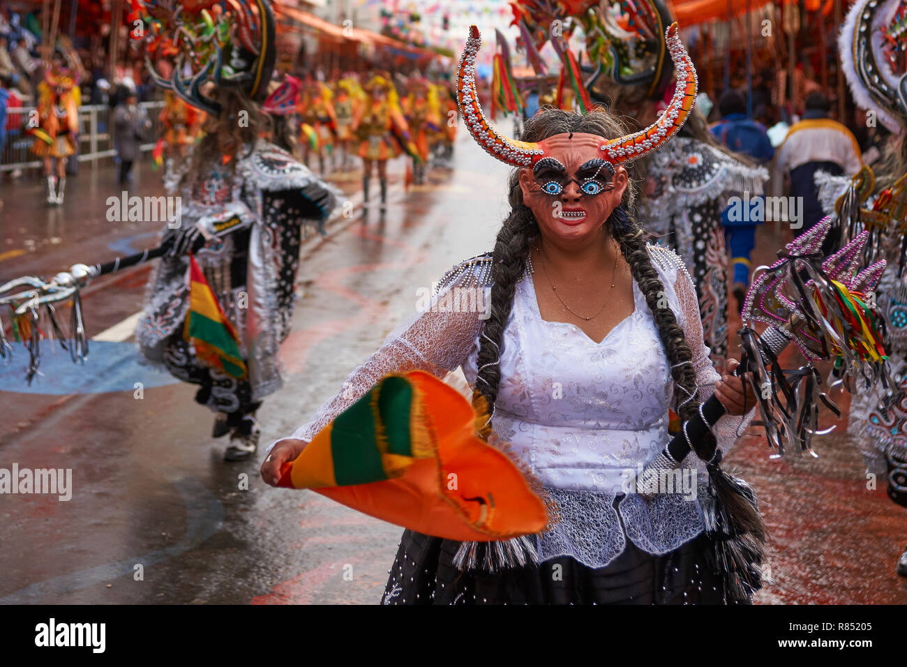 Diablada dancers in ornate costumes parade through the mining city of ...