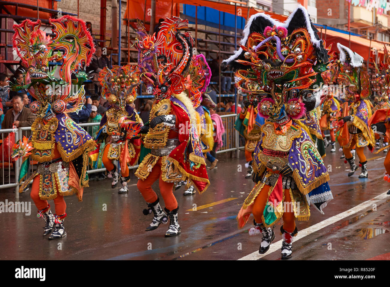 Diablada dancers in ornate costumes parade through the mining city of ...