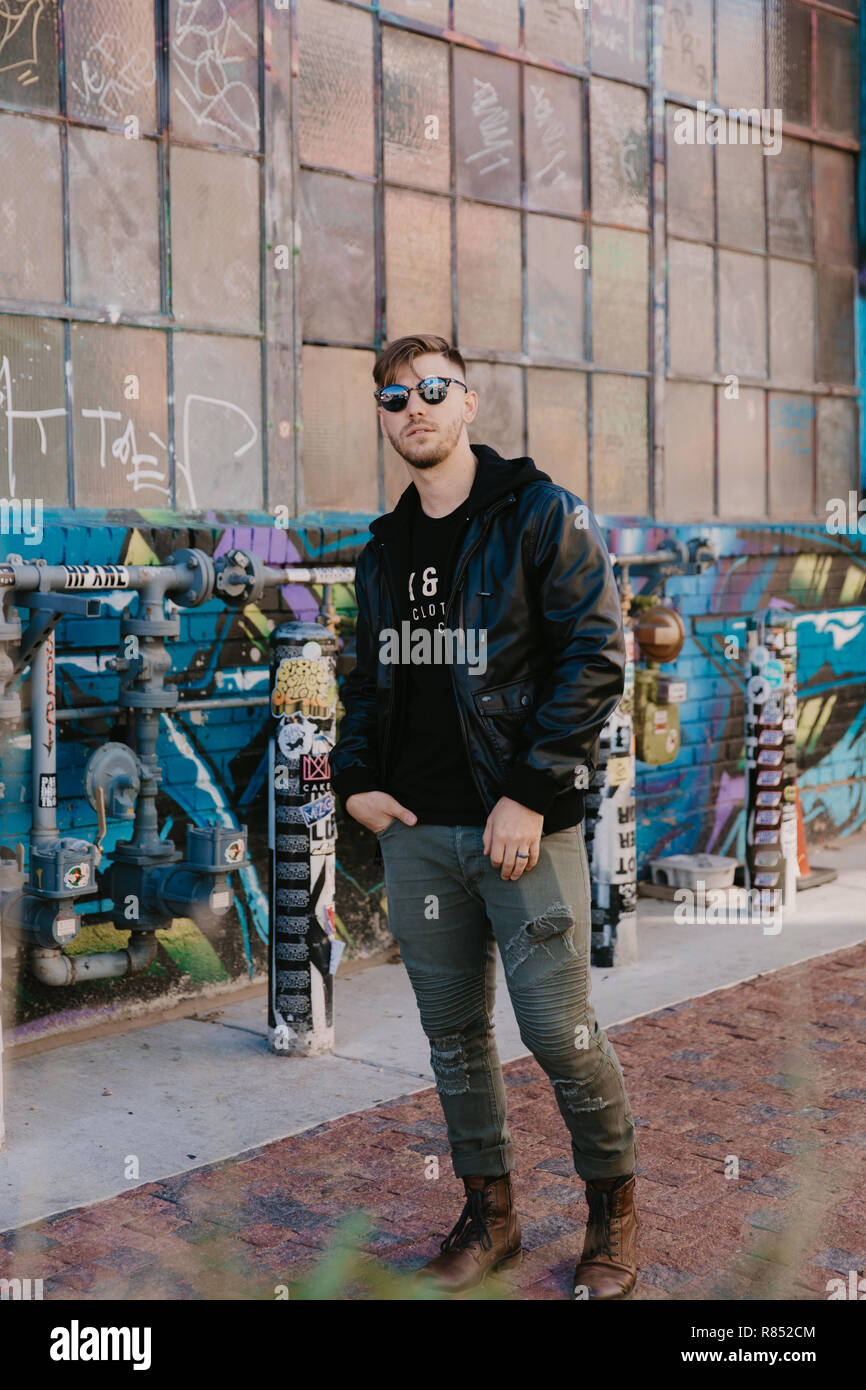 Urban attractive guy graffiti hi-res stock photography and images - Alamy