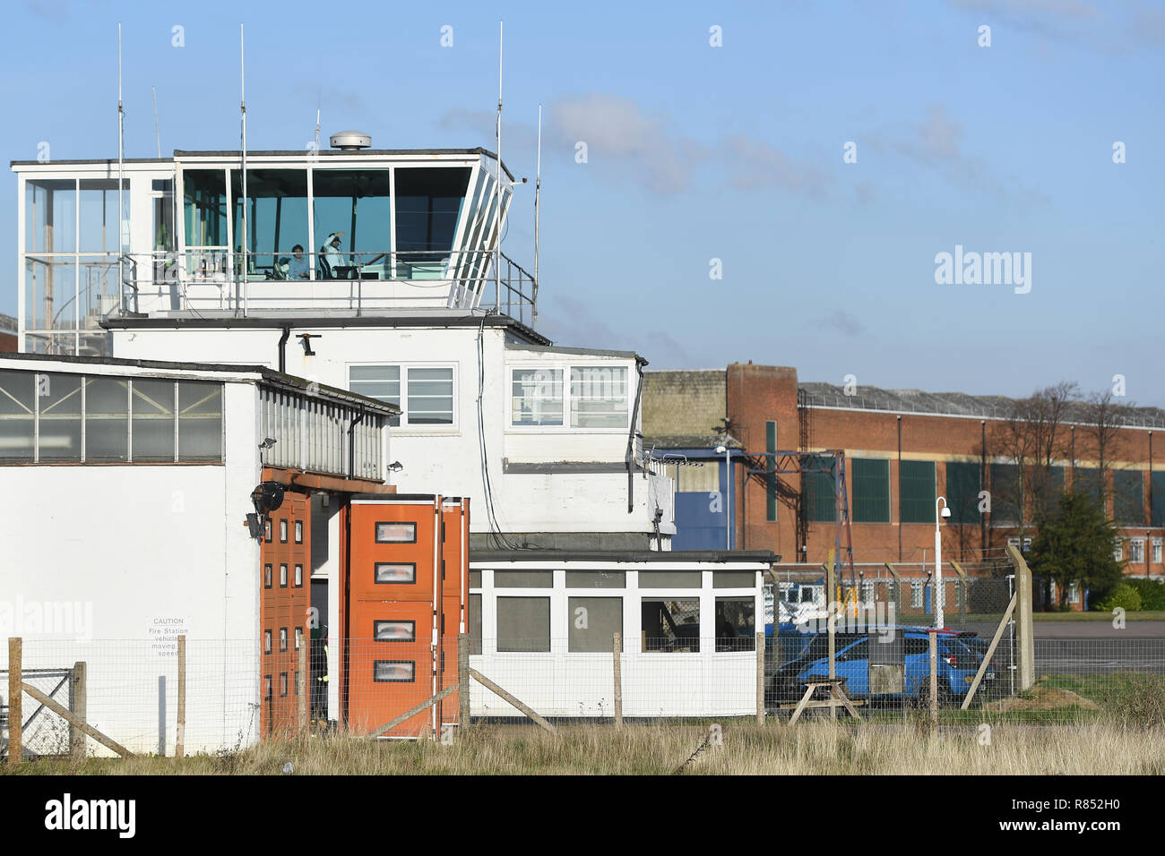 Air traffic controllers work in the old tower at Cranfield Airport in ...