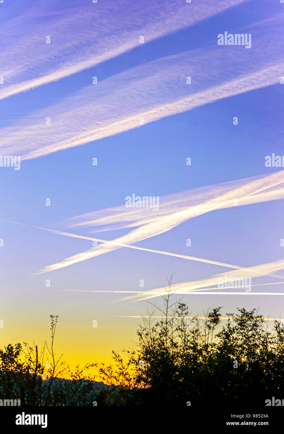 Aircraft vapour trails (Contrails) which form after the passage of a ...