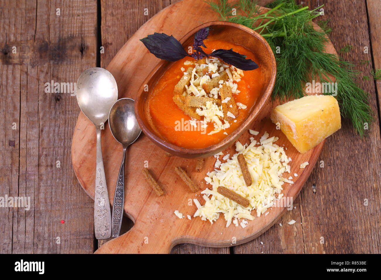 Cheese puree soup with croutons Stock Photo - Alamy