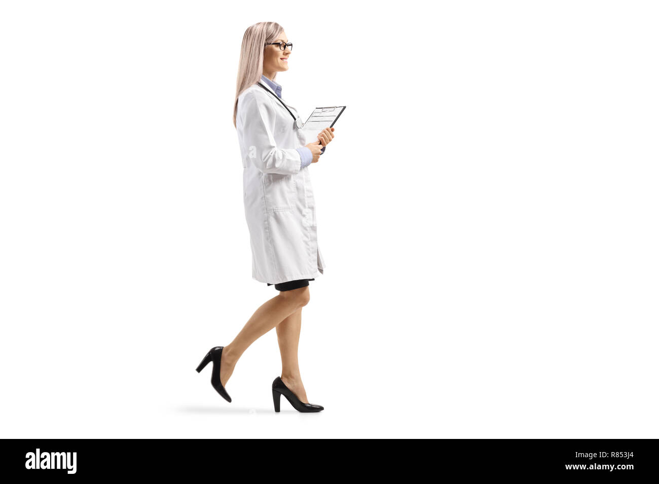 Doctor walking hi-res stock photography and images - Alamy