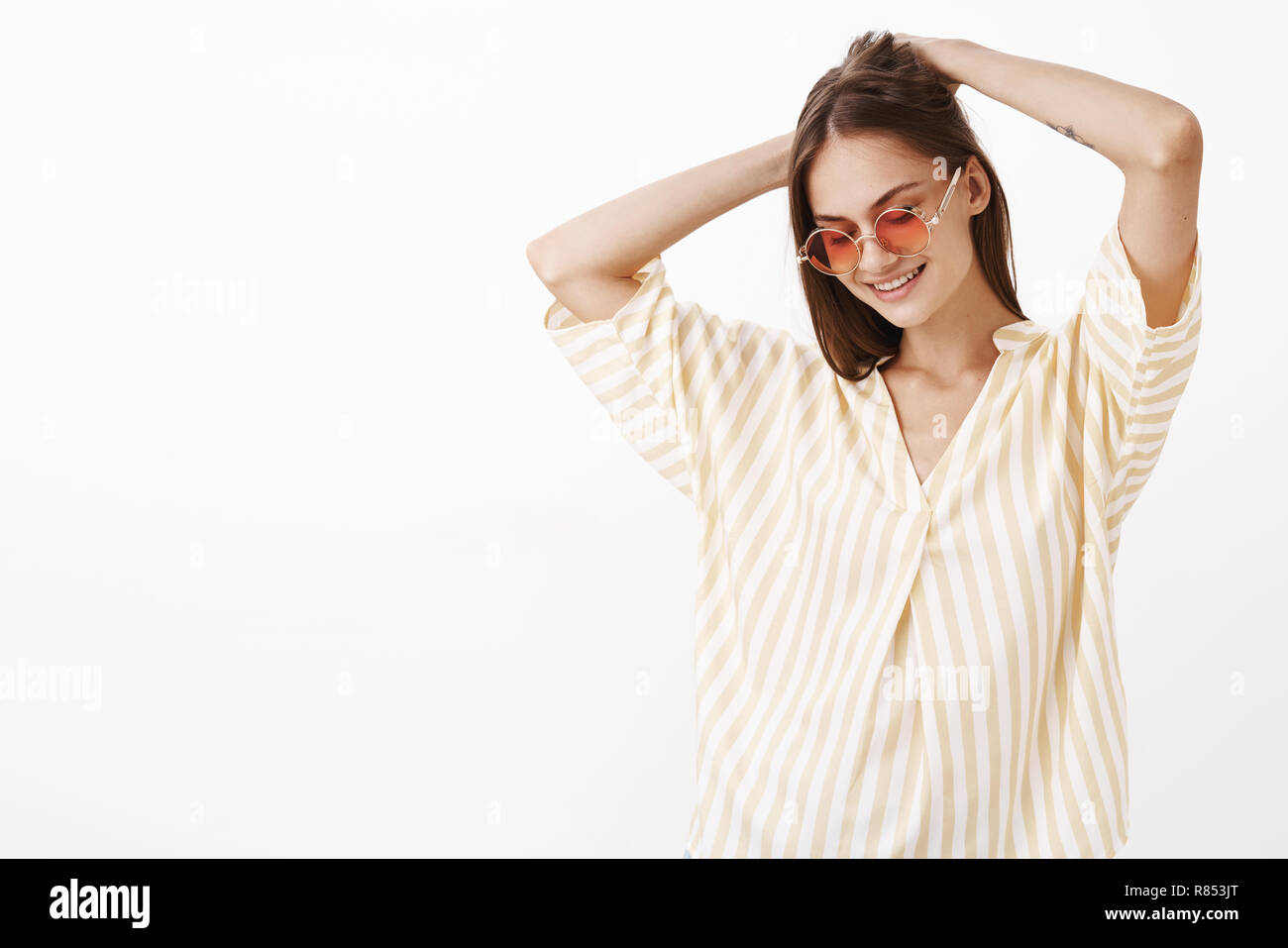 Building her own style. Portrait of charming creative and stylish young ...