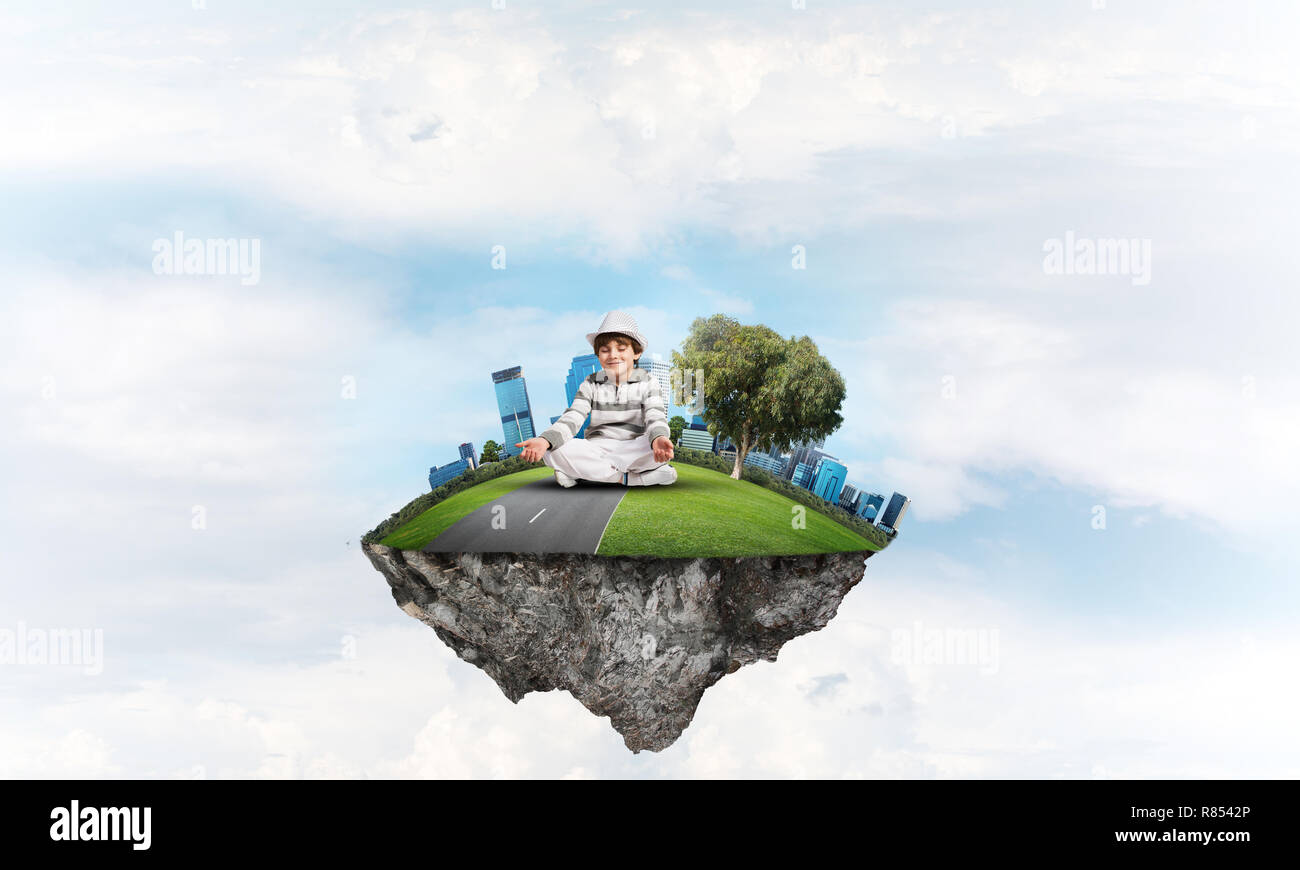 Little boy keeping mind conscious Stock Photo - Alamy