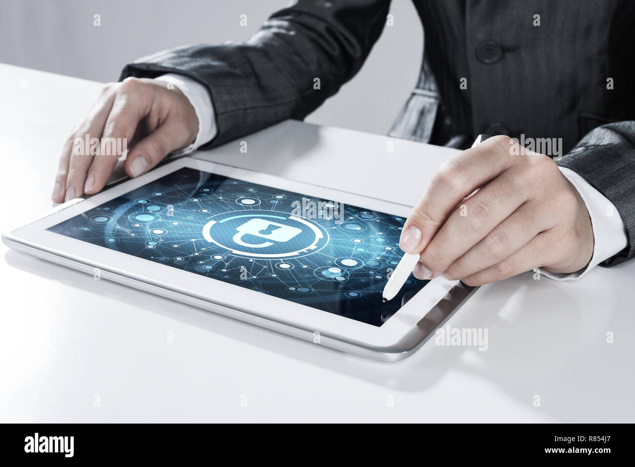 Internet security concept with woman working on media screen wit Stock ...