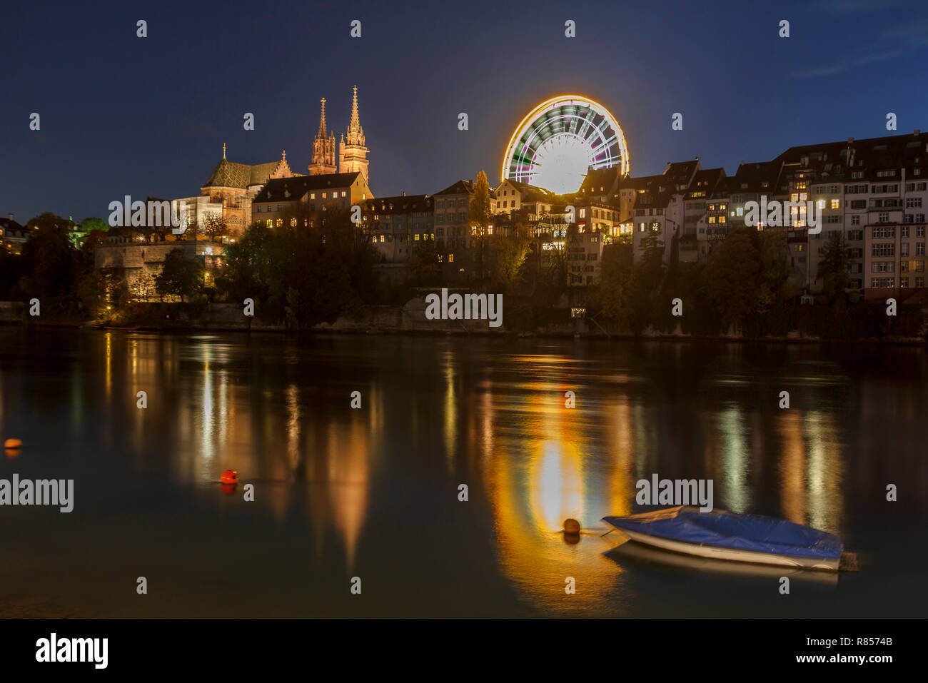 Basel cathedral over the river Rhine, at the autumn fair with the ...
