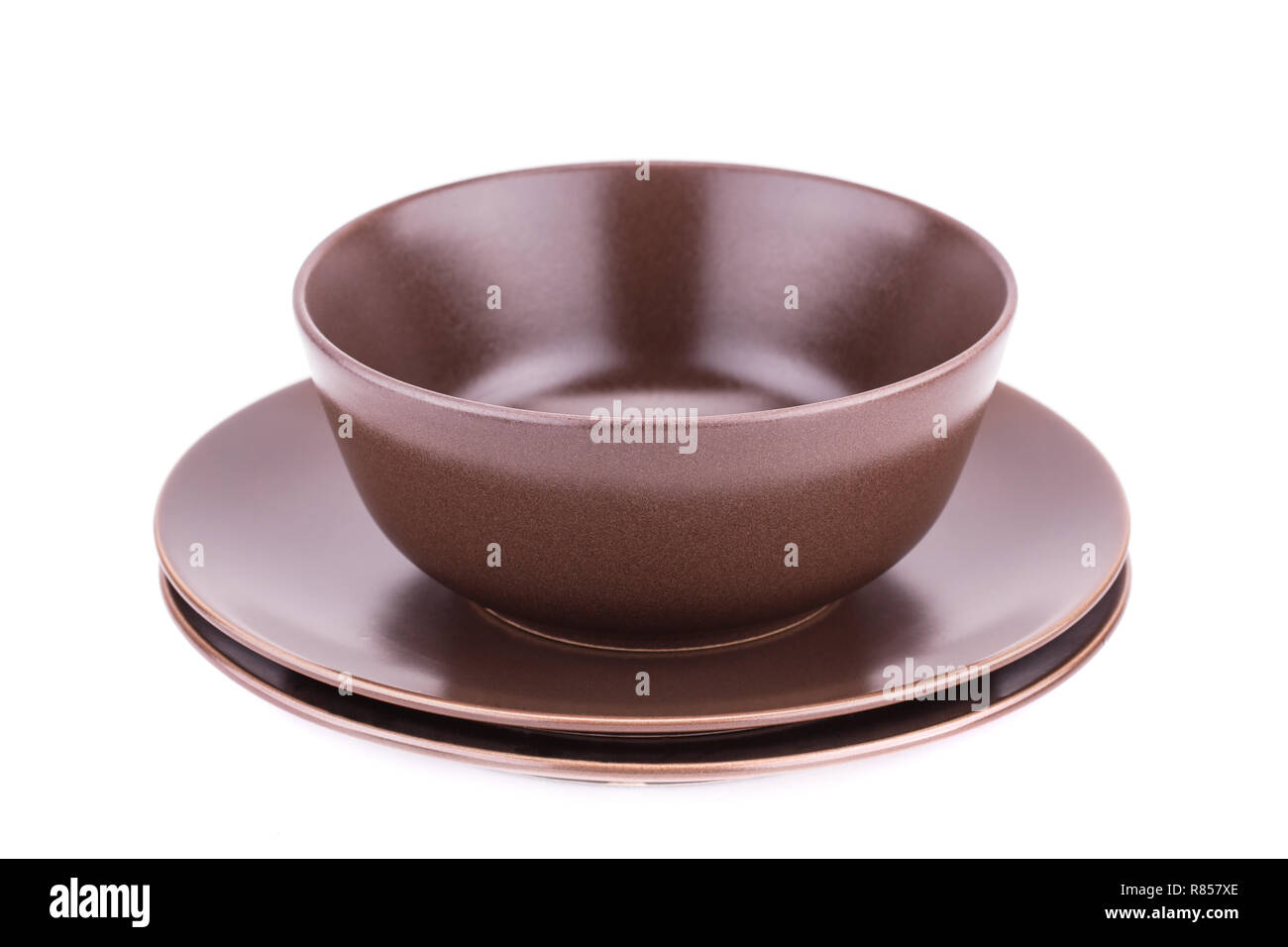 Bowl and plates isolated on white background Stock Photo - Alamy