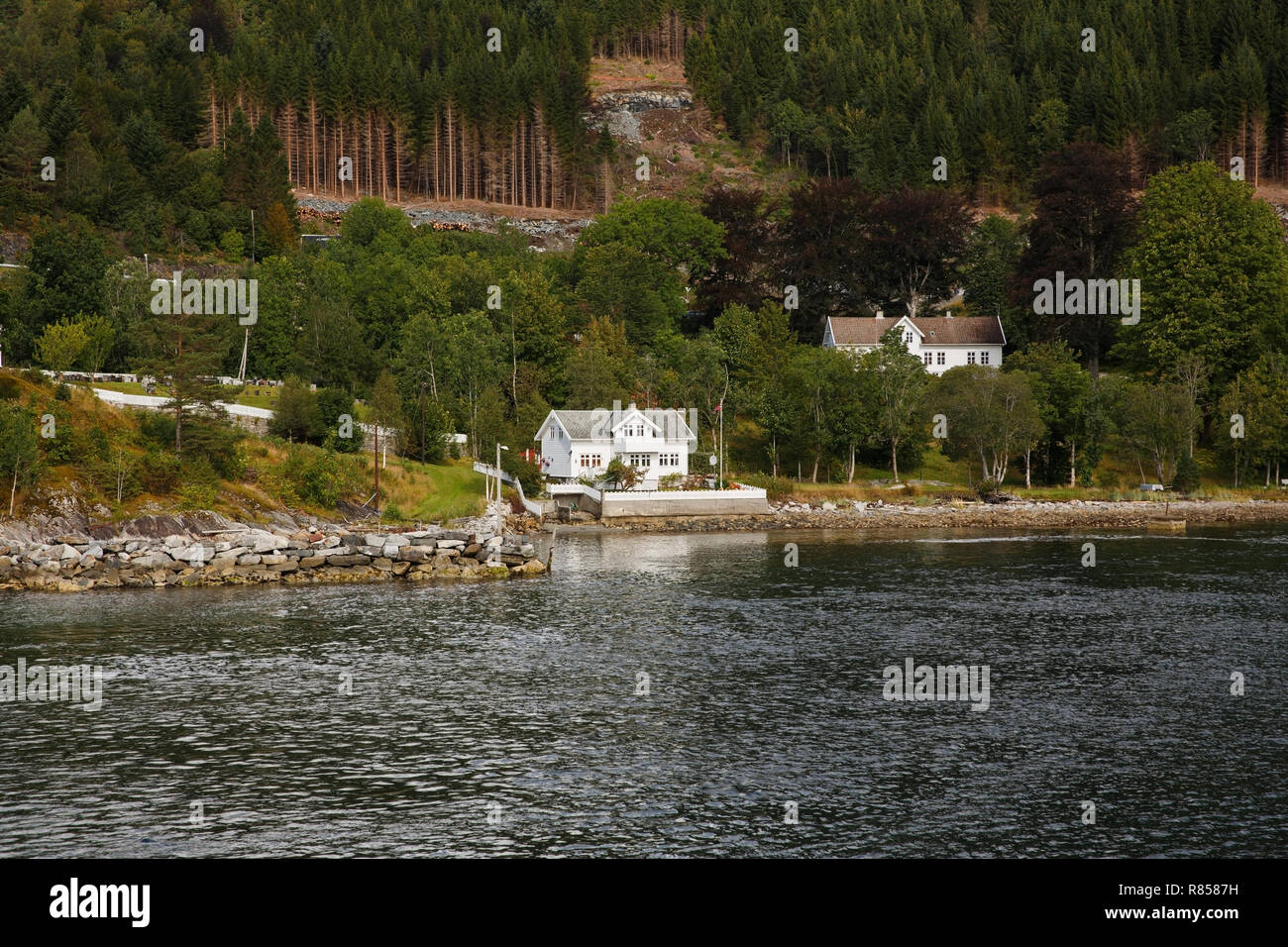 Landscape with mountains, fjord and village in Norway Stock Photo - Alamy