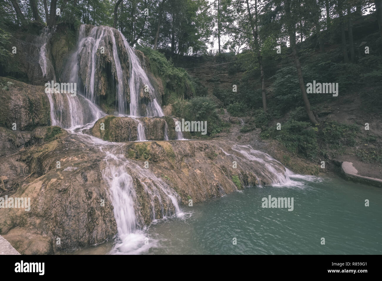 fresh clean waterfall in summer with loads of water - vintage retro ...