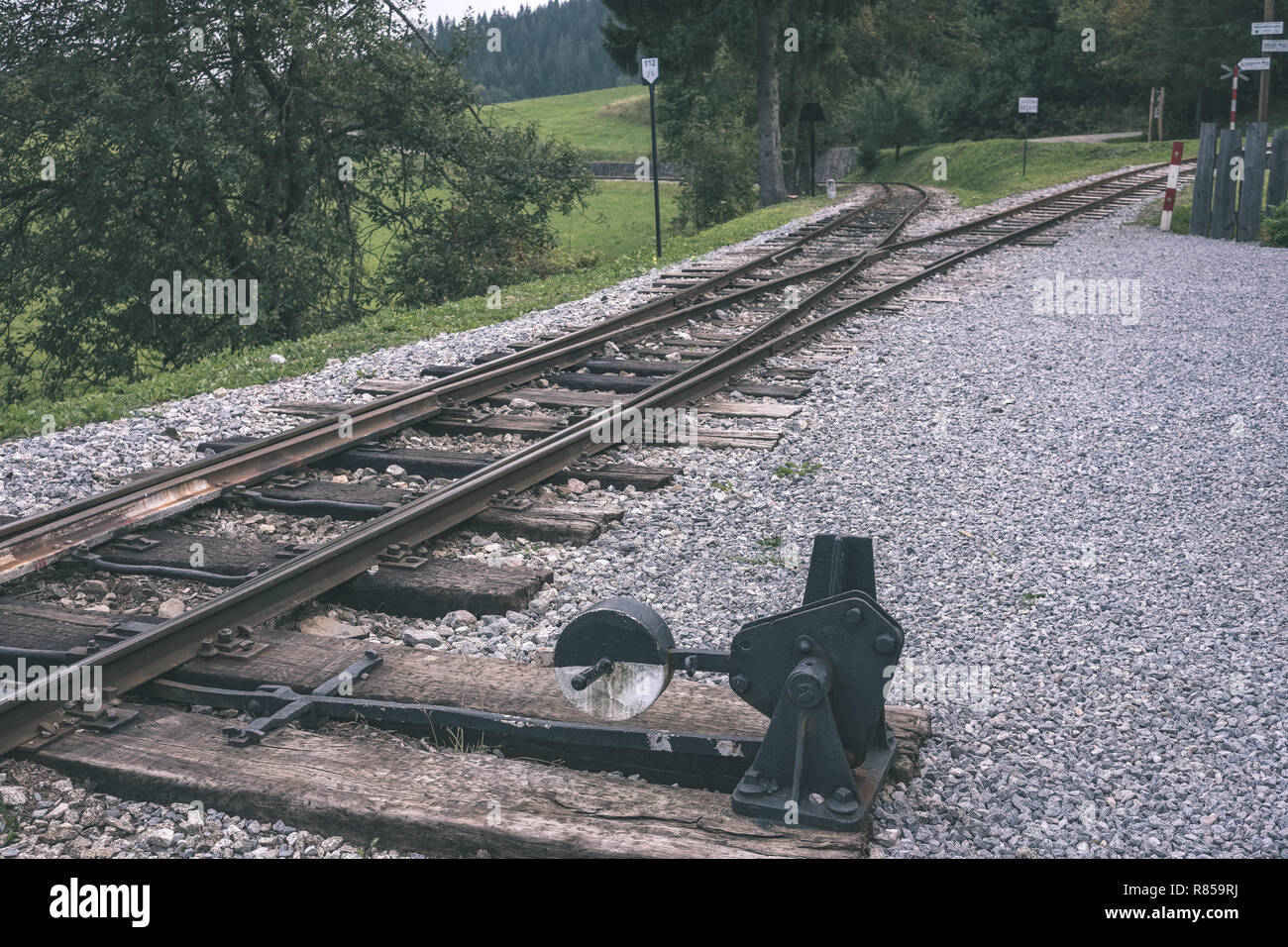 ancient log wood railway and train on the tracks. tourist attraction ...