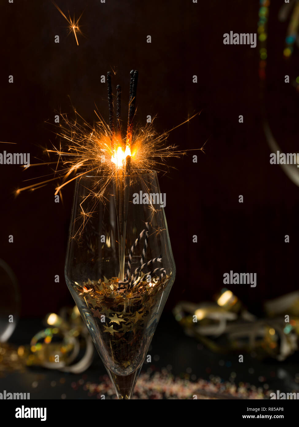 new year background with star splatter and sparkler and different new ...