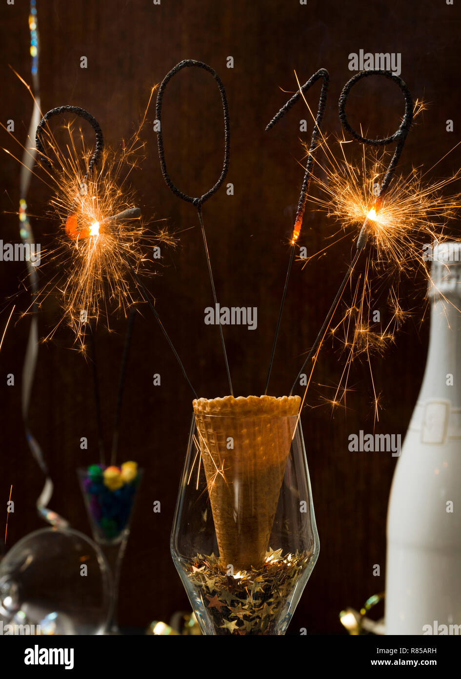 new year background with star splatter and sparkler and different new ...