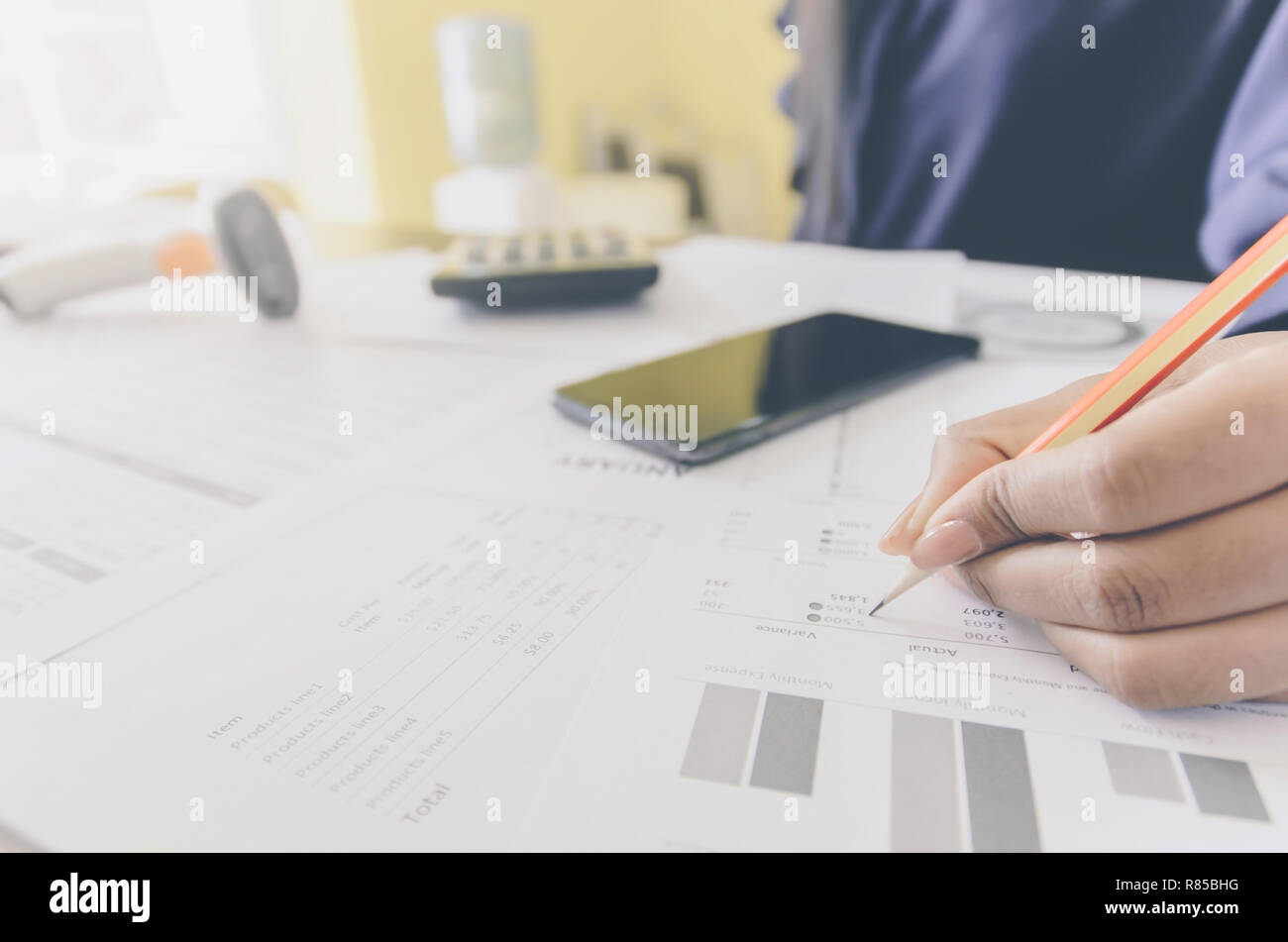 Business concept of financial and accounting with human hand are ...