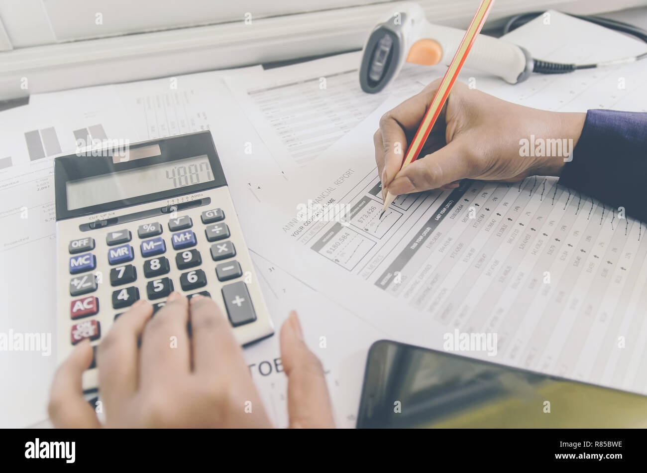 Business concept of financial and accounting with human hand are ...