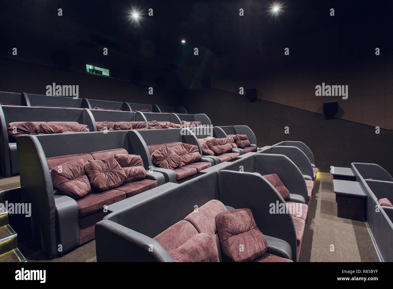 Empty silver cinema room interior with white screen and seats Stock Photo - Alamy