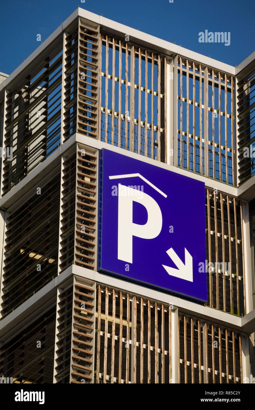A graphic parking sign with the letter P on a multi-storey car park in ...