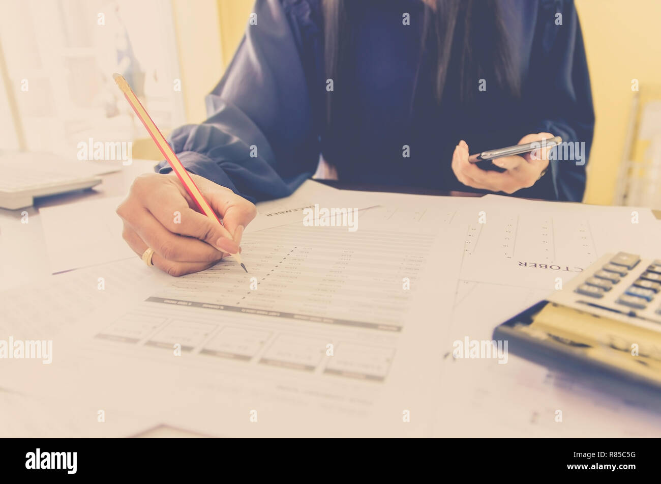 Business concept of financial and accounting with human hand are ...