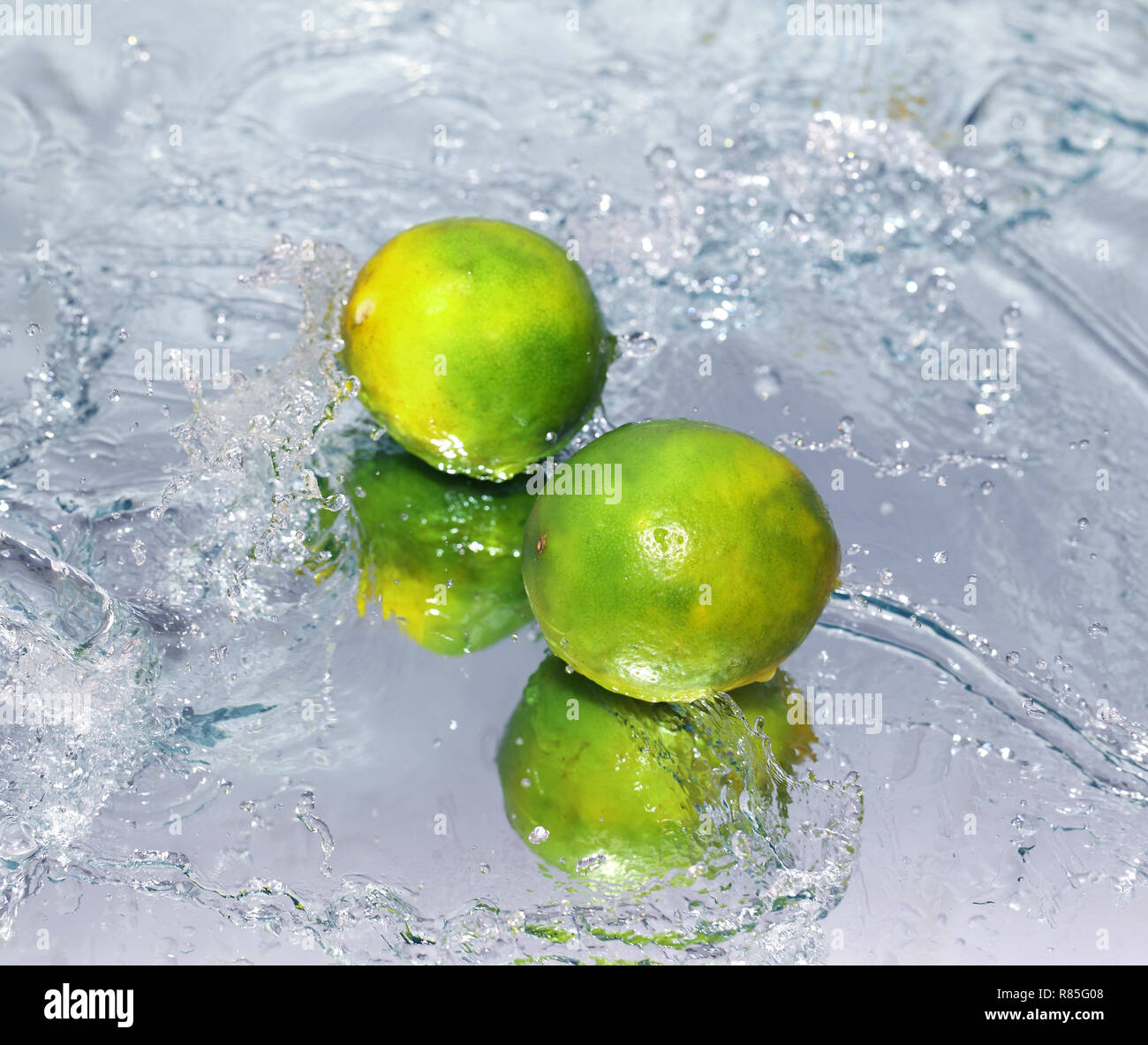 Lime on a wet surface Stock Photo - Alamy