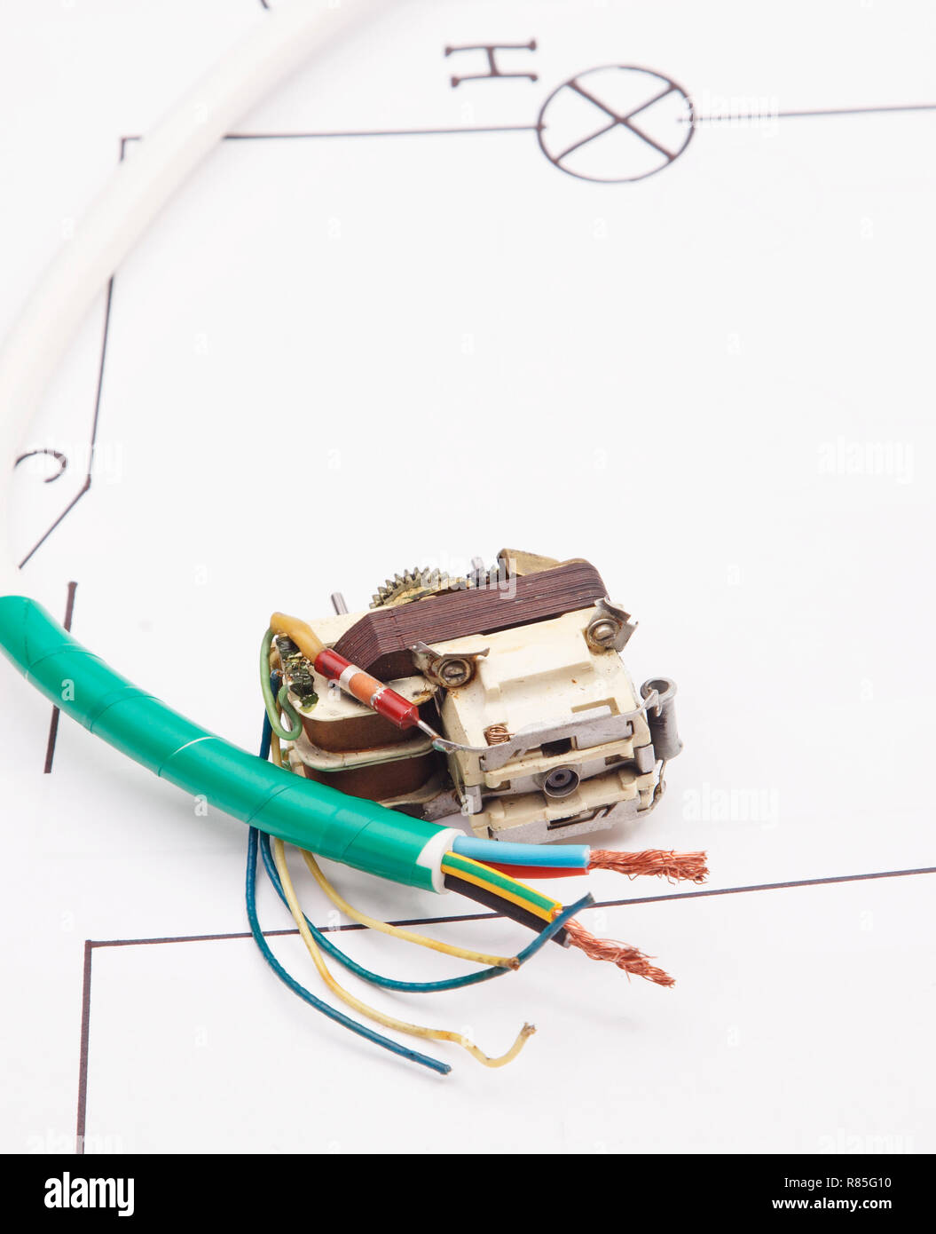 Electric wire and disassembled transformer Stock Photo - Alamy