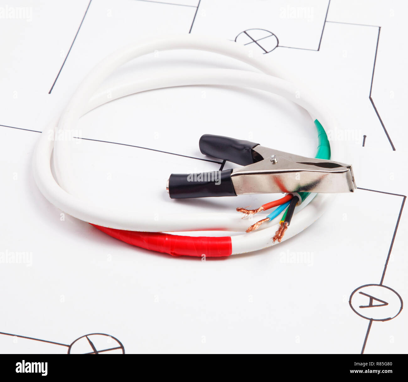Electric clamps and electric cable on a background of the electric ...
