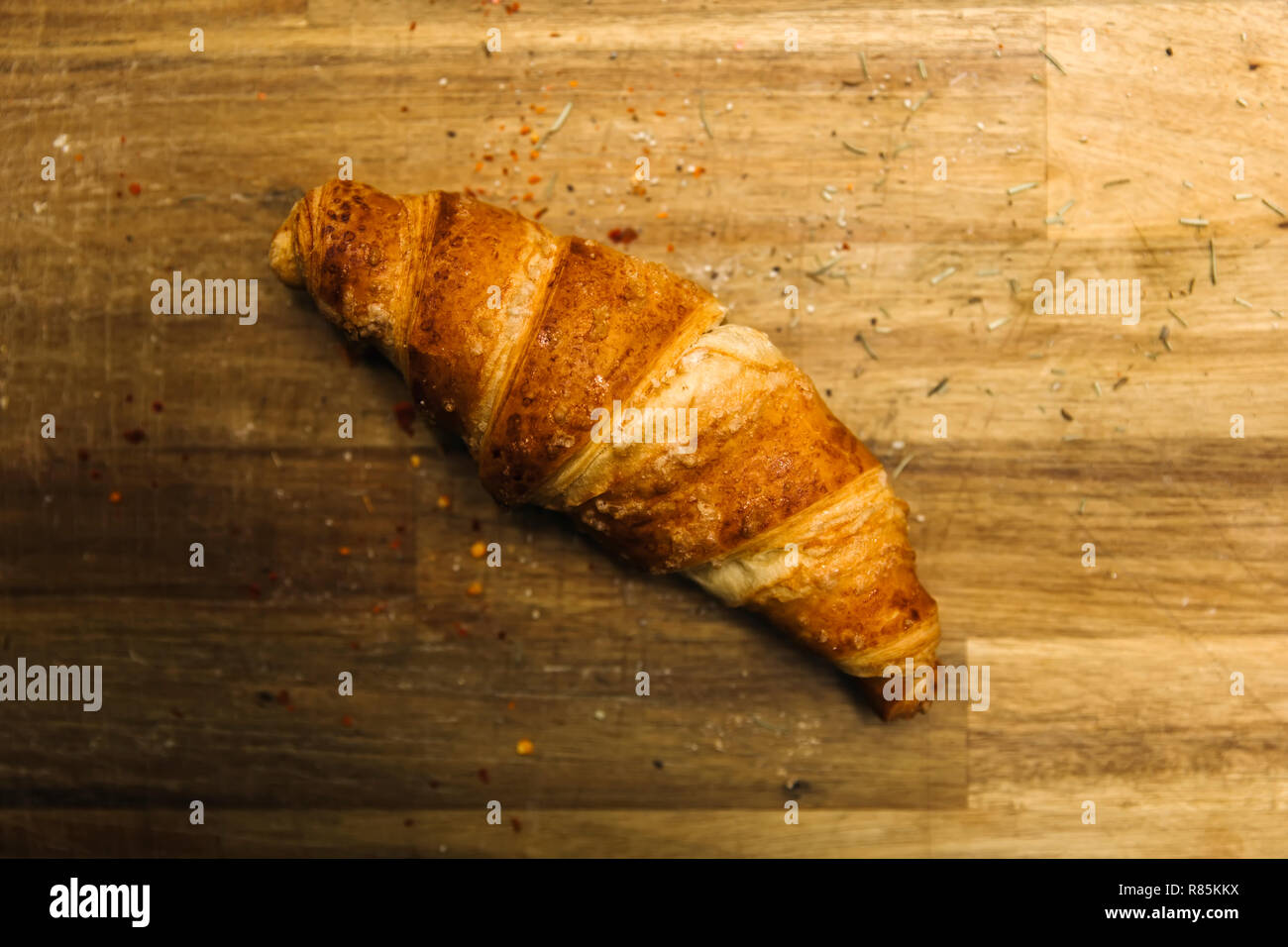 Fresh french croissant on the wooden table Stock Photo - Alamy
