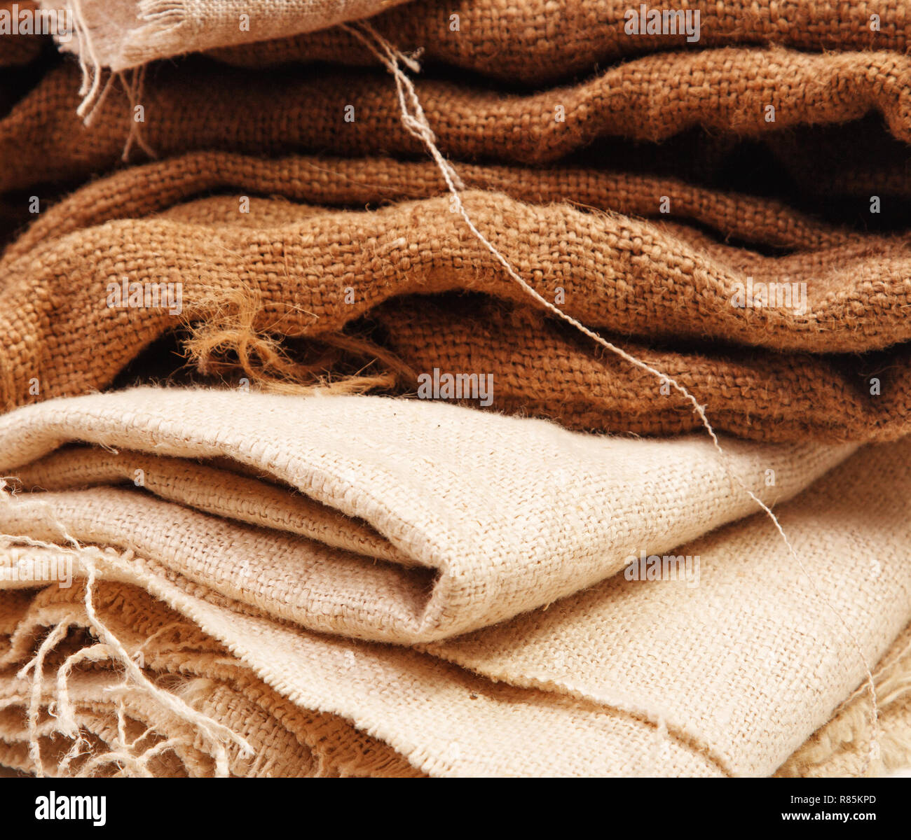 A stack of folded burlap Stock Photo - Alamy