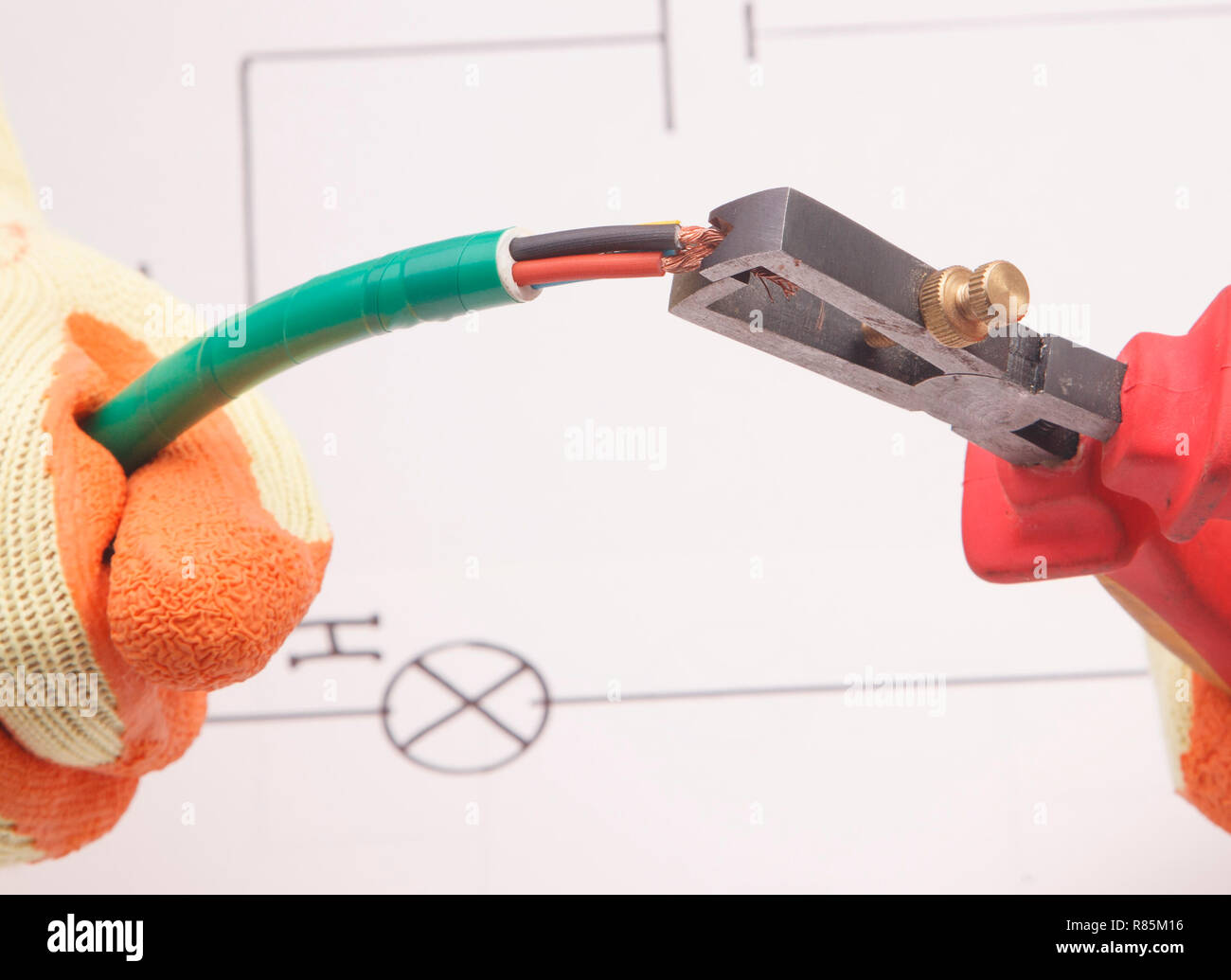 Stripping electrical wires Stock Photo - Alamy