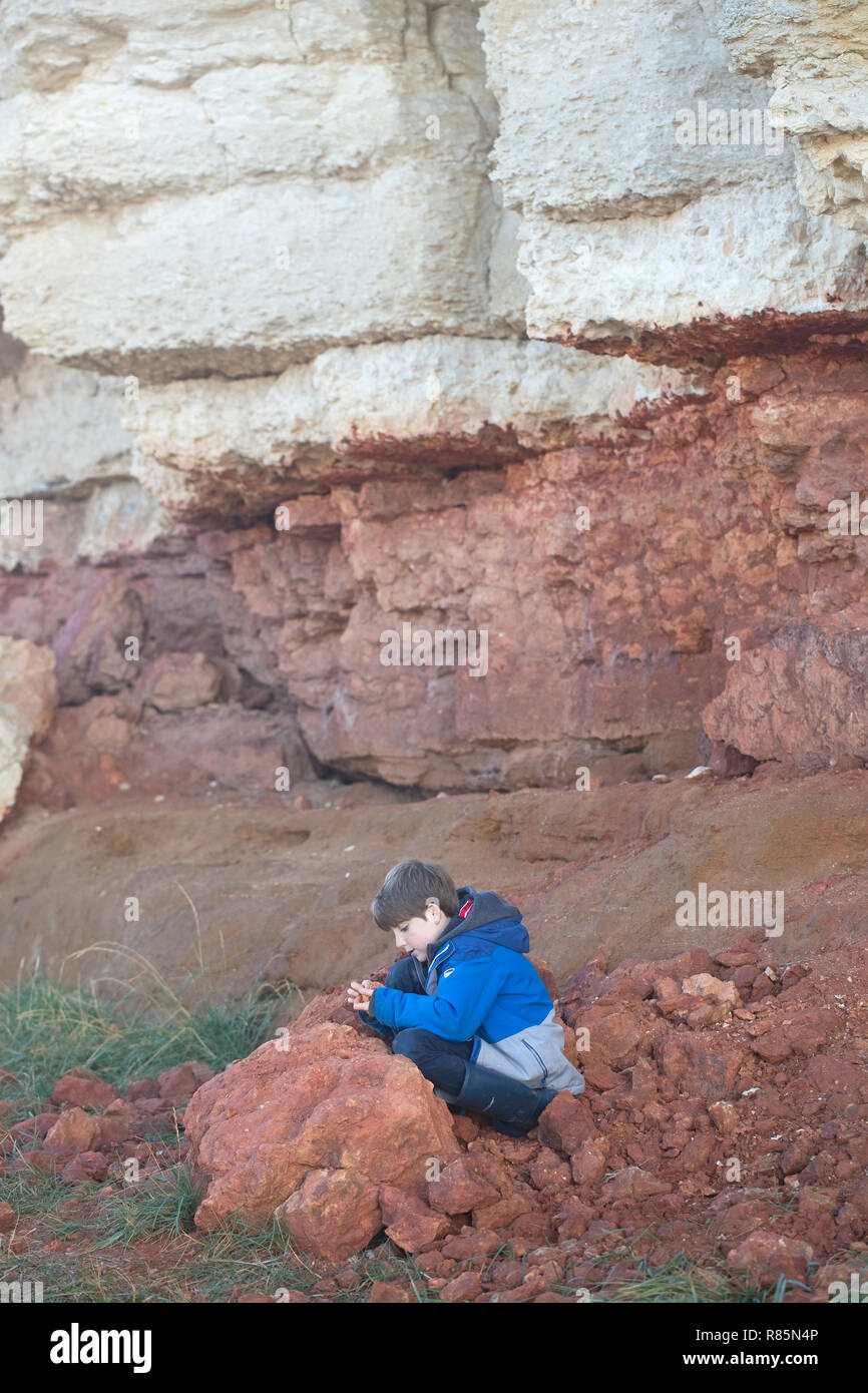 Fossil hunting Hunstanton Norfolk Stock Photo - Alamy