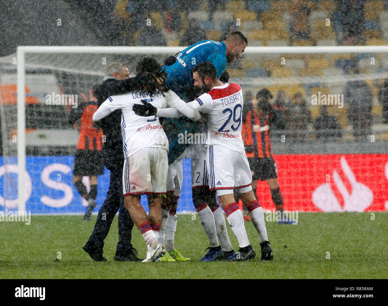 Lyon's head coach Bruno Genesio and his players are seen celebrating ...