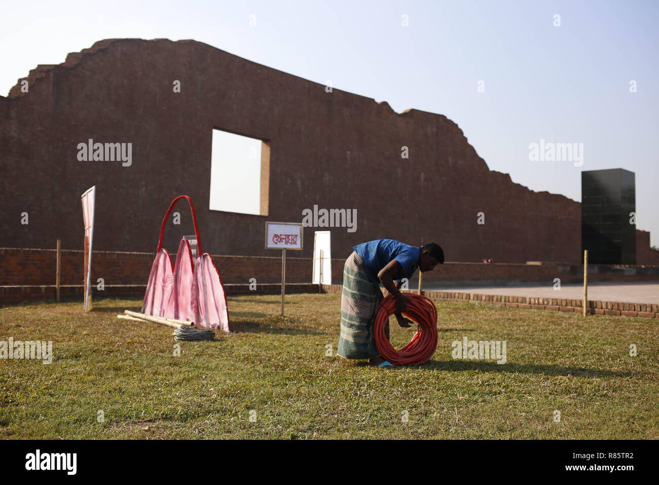 Dhaka, Bangladesh. 13th Dec, 2018. A worker works in front of the ...