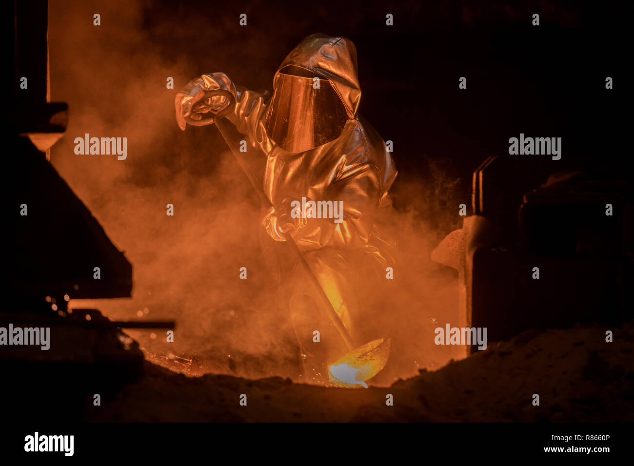 Duisburg, Germany. 10th Dec, 2018. A blast furnace operator takes a ...