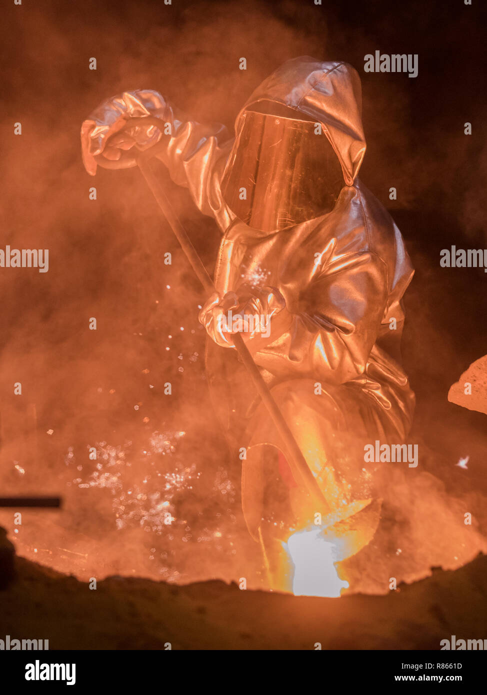 Duisburg, Germany. 10th Dec, 2018. A blast furnace operator takes a ...