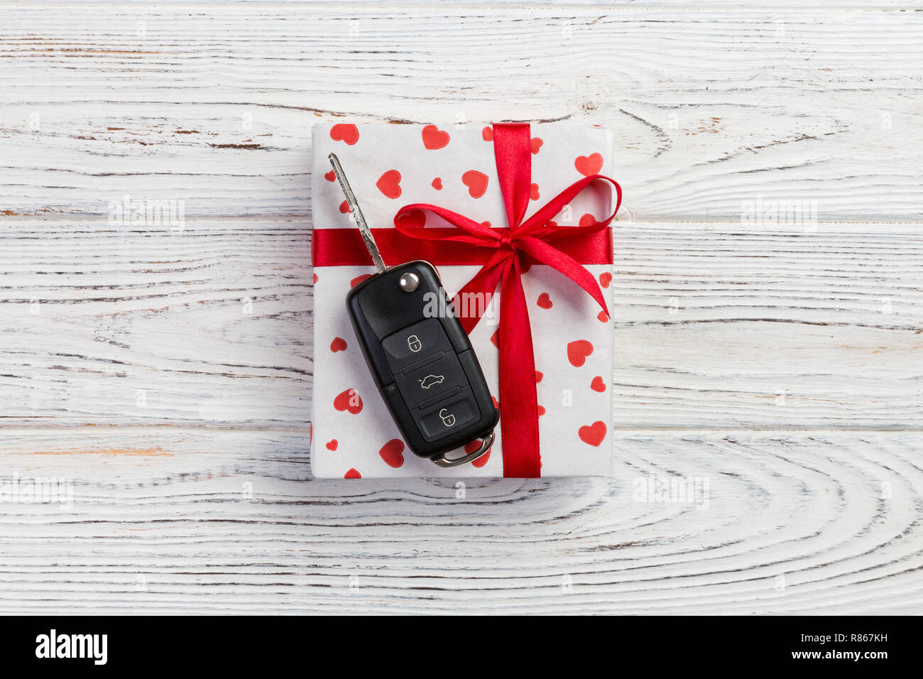 Valentine or other holiday handmade present in paper with red hearts ...