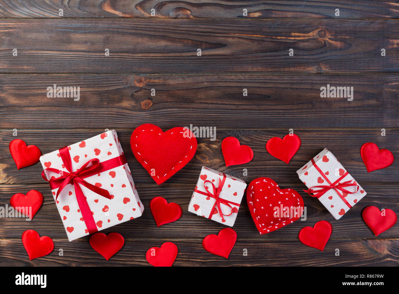 Valentine or other holiday handmade present in paper with red hearts ...