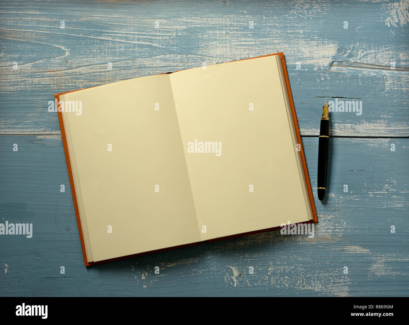 open book with blank pages on wooden table - closeup Stock Photo - Alamy