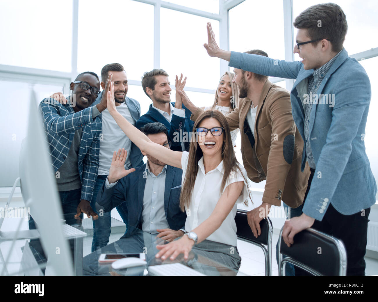 Ambitious young female celebrating success hi-res stock photography and ...
