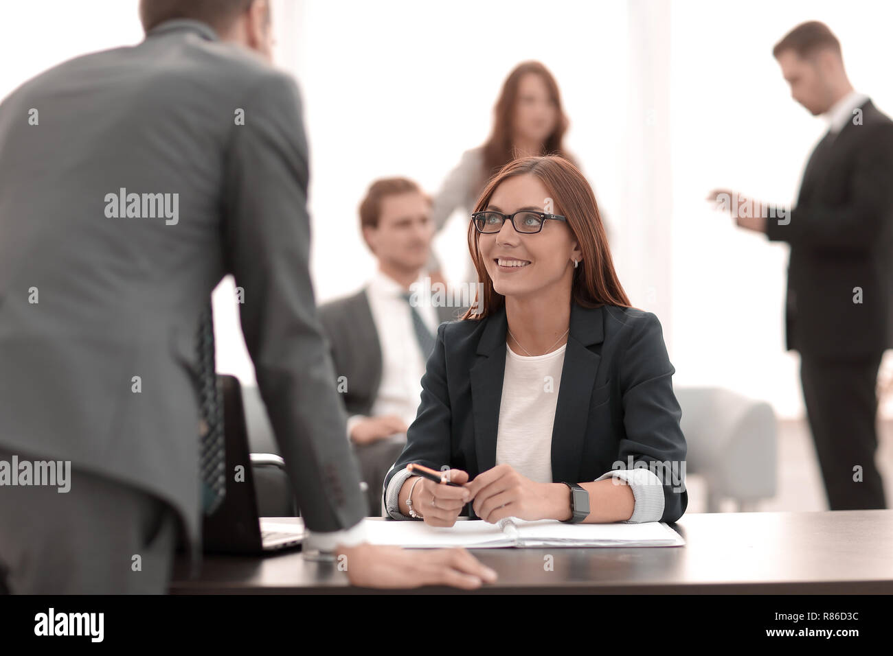 Successful businesswoman explaining something hi-res stock photography ...