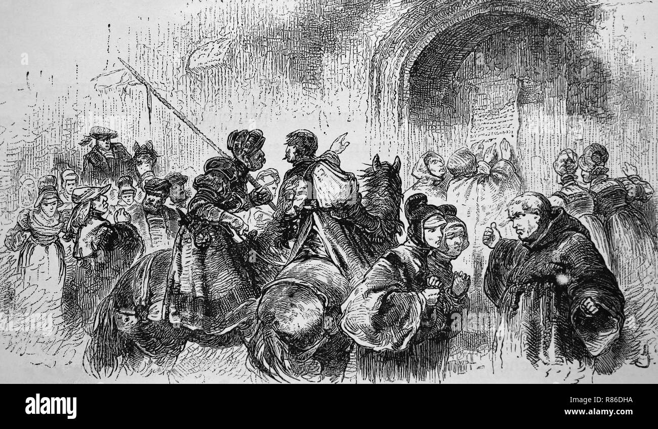 Martin Luther (1483-1546) naited to the door of the Wittenberg castle ...