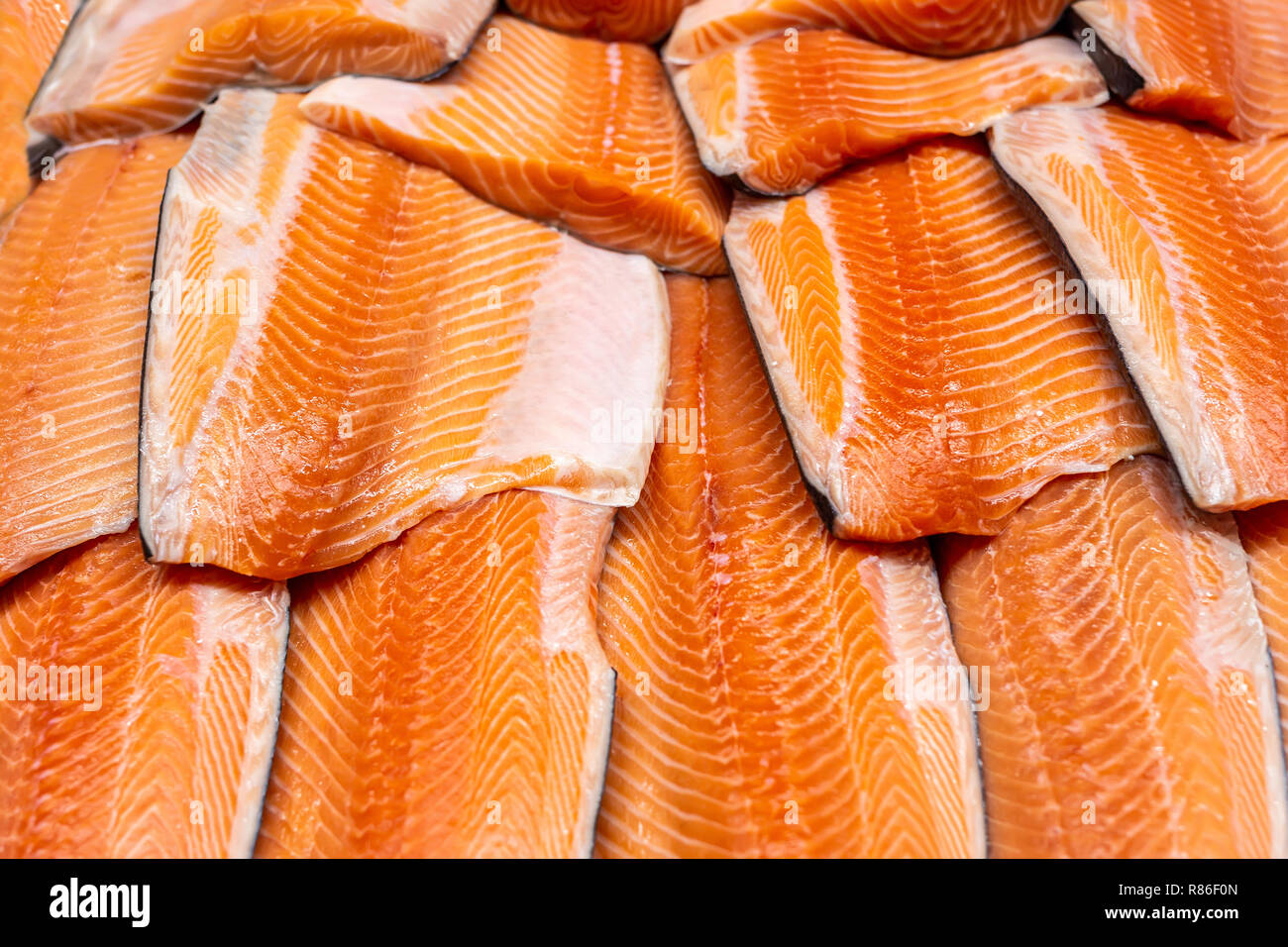 Fresh seafood on crushed ice at fish market. Raw salmon fillet on ...